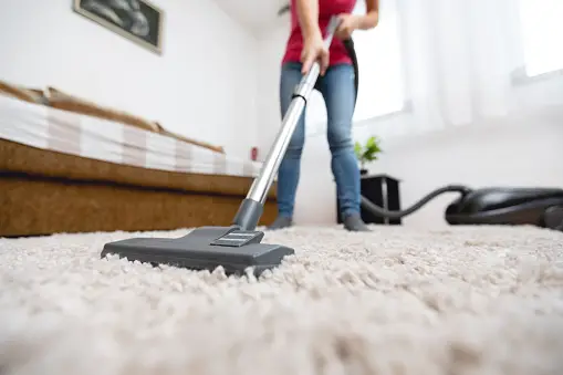 How to Avoid Back Pain While Vacuuming - Cleaning Beasts
